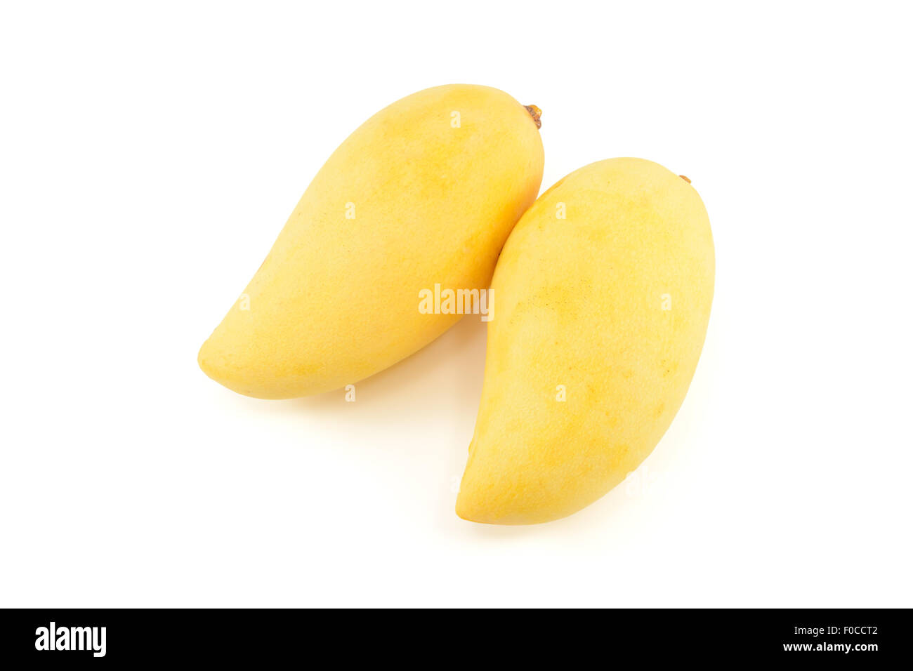 Yellow mango isolated on white background Stock Photo - Alamy