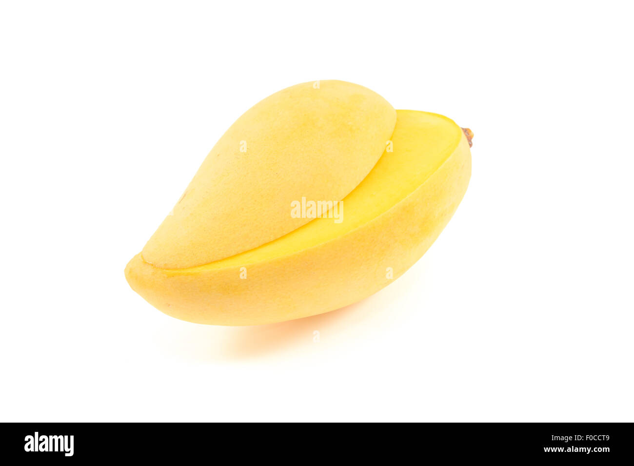 Yellow mango on isolated white background Stock Photo - Alamy