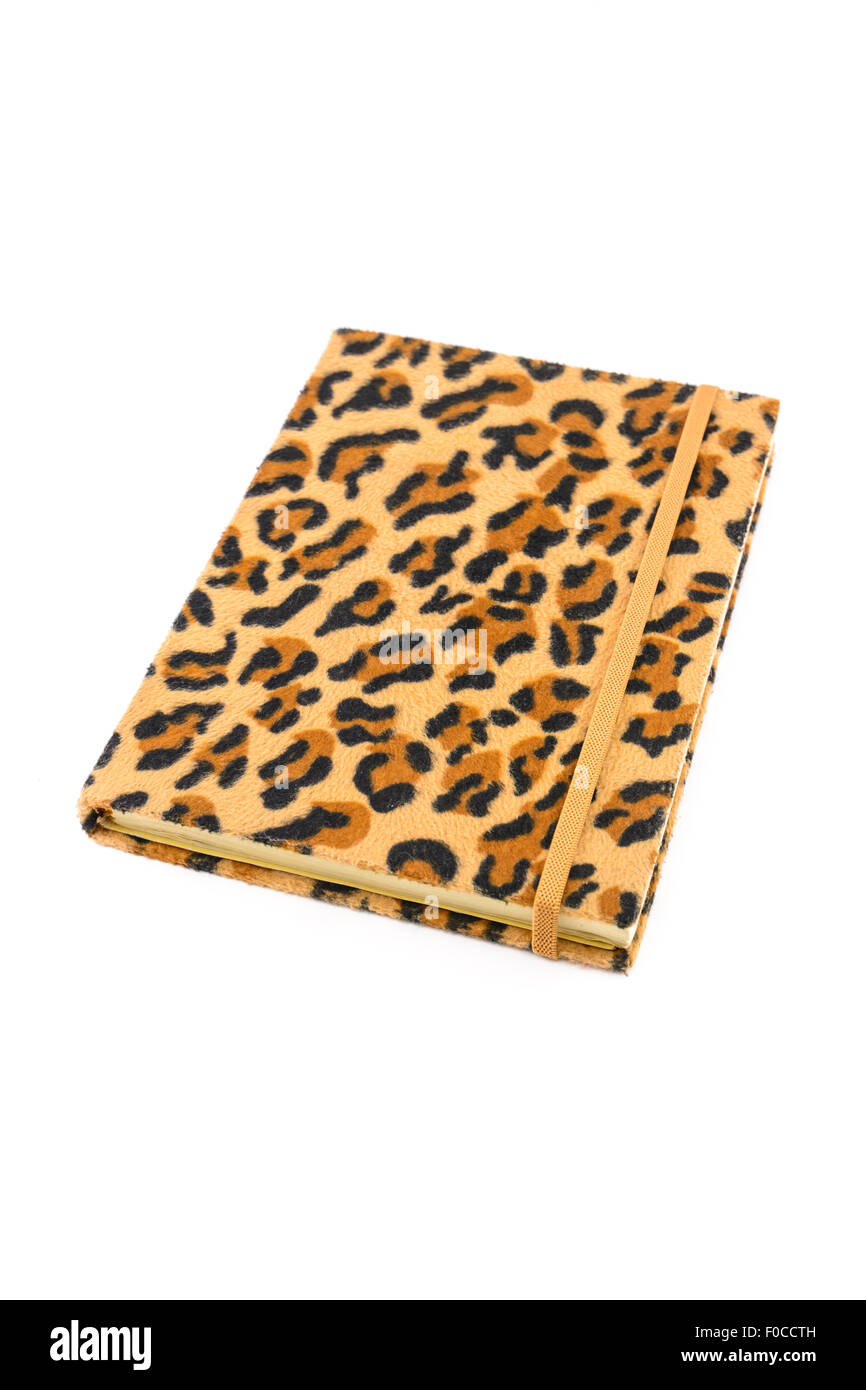 Notebook leopard cover isolated on white background Stock Photo - Alamy