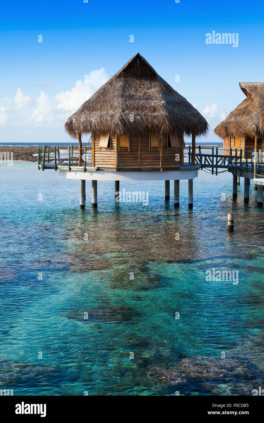 Typical Polynesian landscape -small houses on water Stock Photo - Alamy