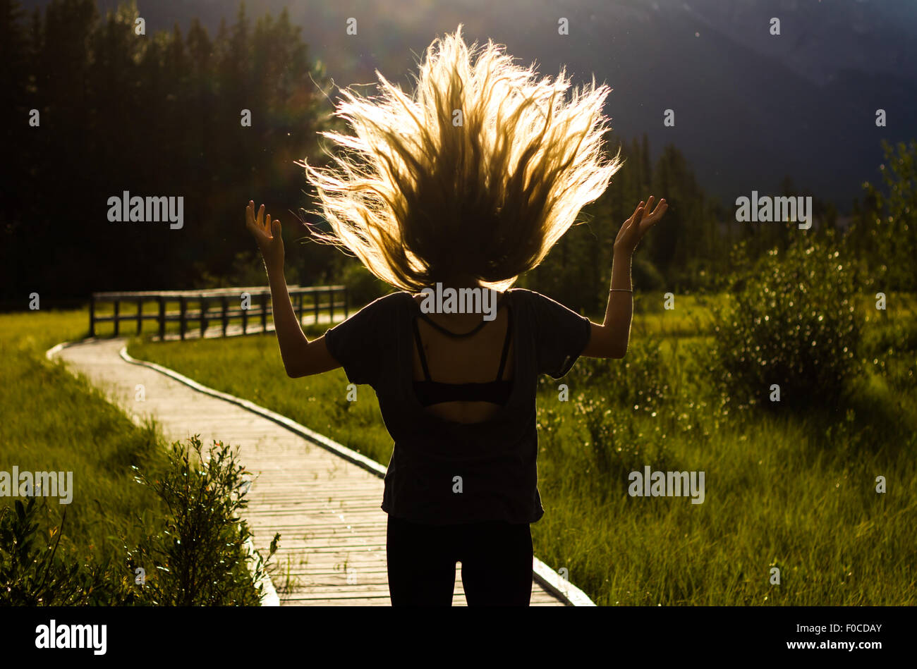 Hair flick hi-res stock photography and images - Alamy