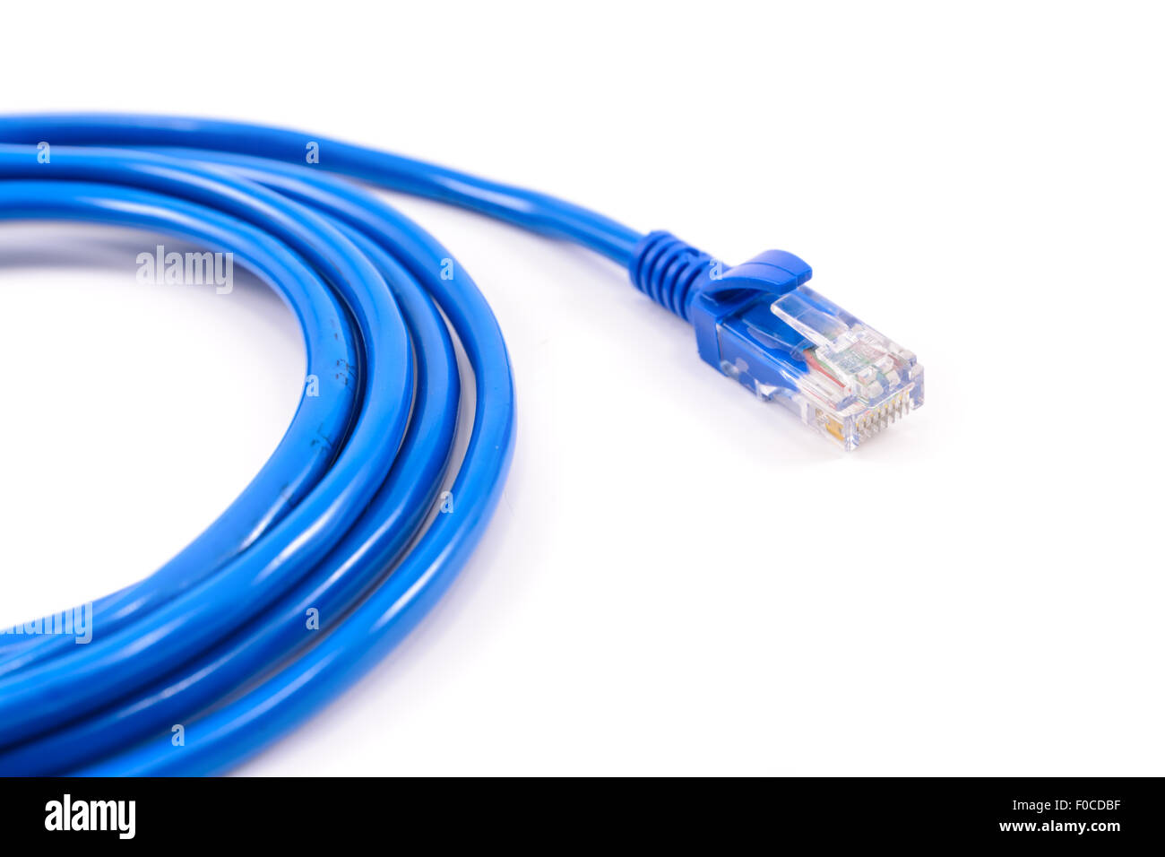 Blue network cable isolated on white background Stock Photo - Alamy
