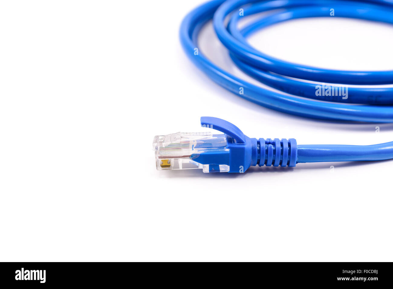 Blue network cable isolated on white background Stock Photo - Alamy