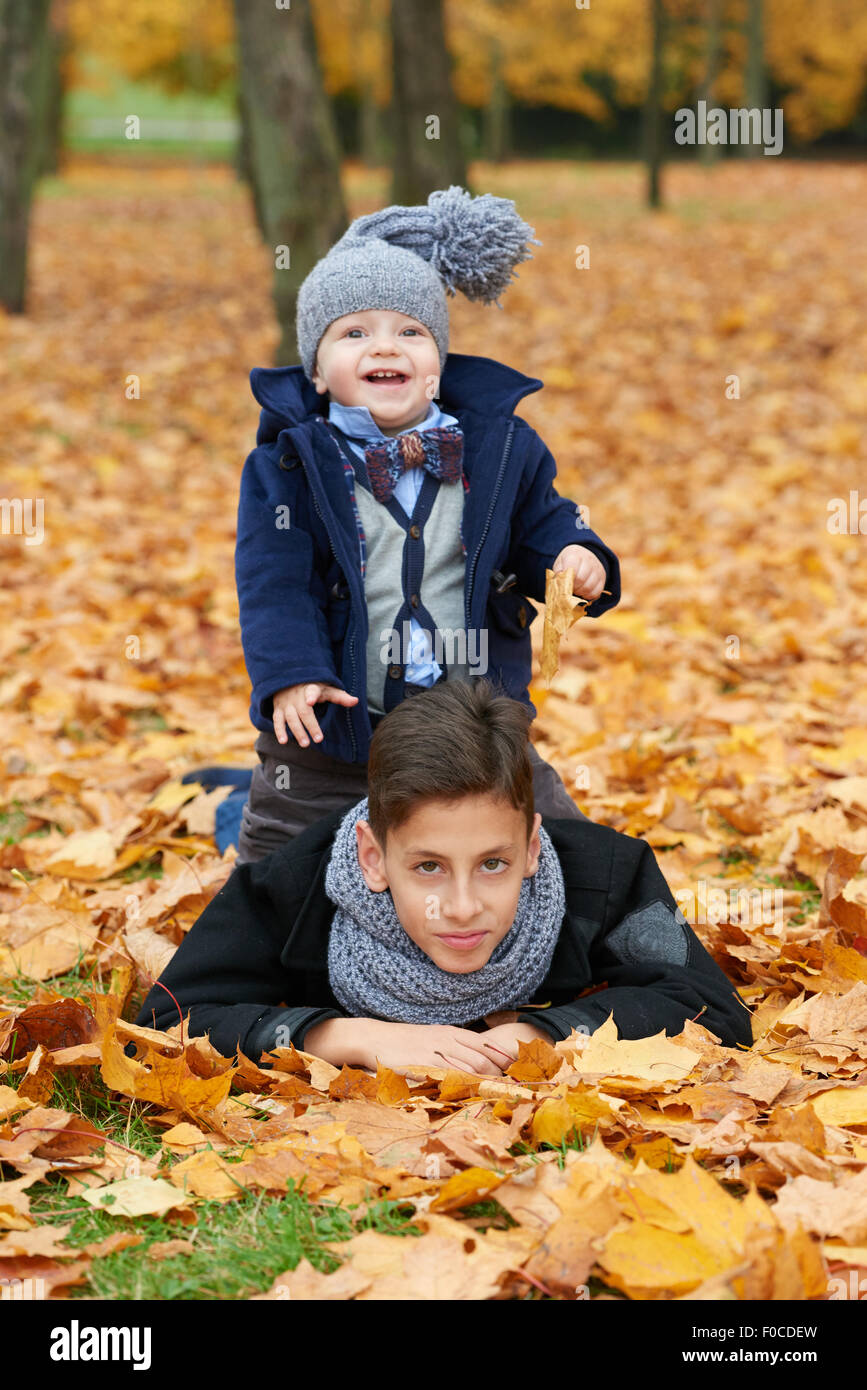 happy children in autumn park Stock Photo - Alamy