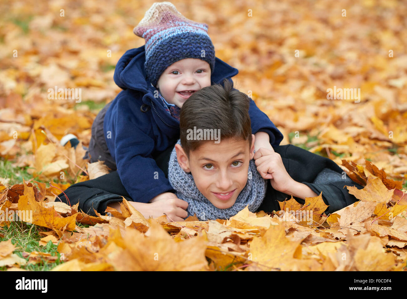 happy children in autumn park Stock Photo - Alamy