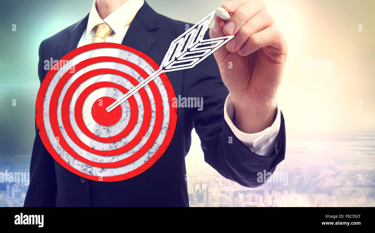 Business man drawing target with chalk Stock Photo - Alamy