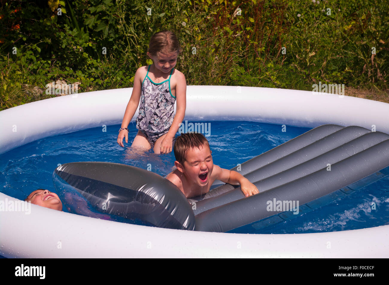 Children having fun garden hi-res stock photography and images - Alamy