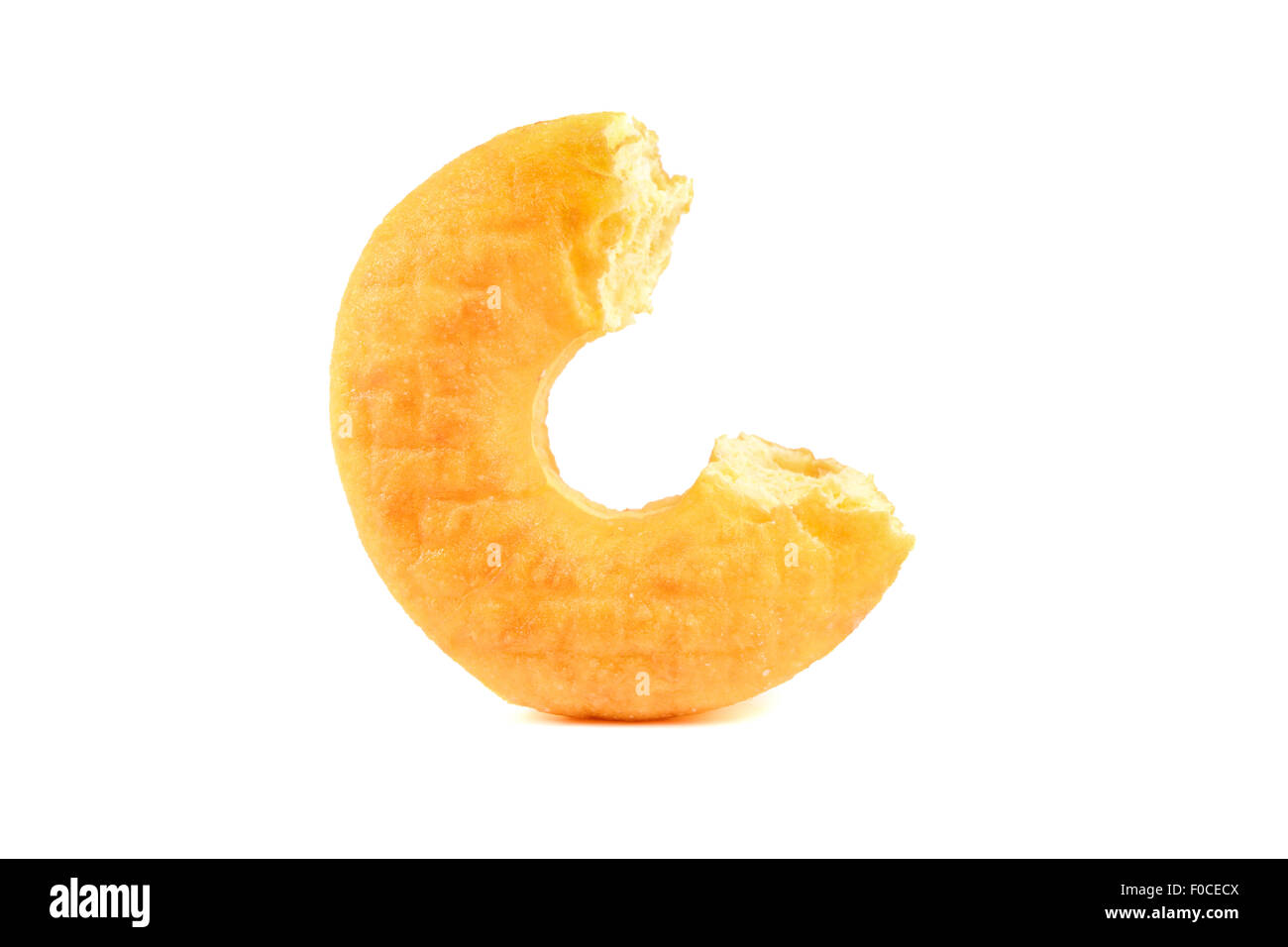 Donut bitten isolated on white background Stock Photo - Alamy