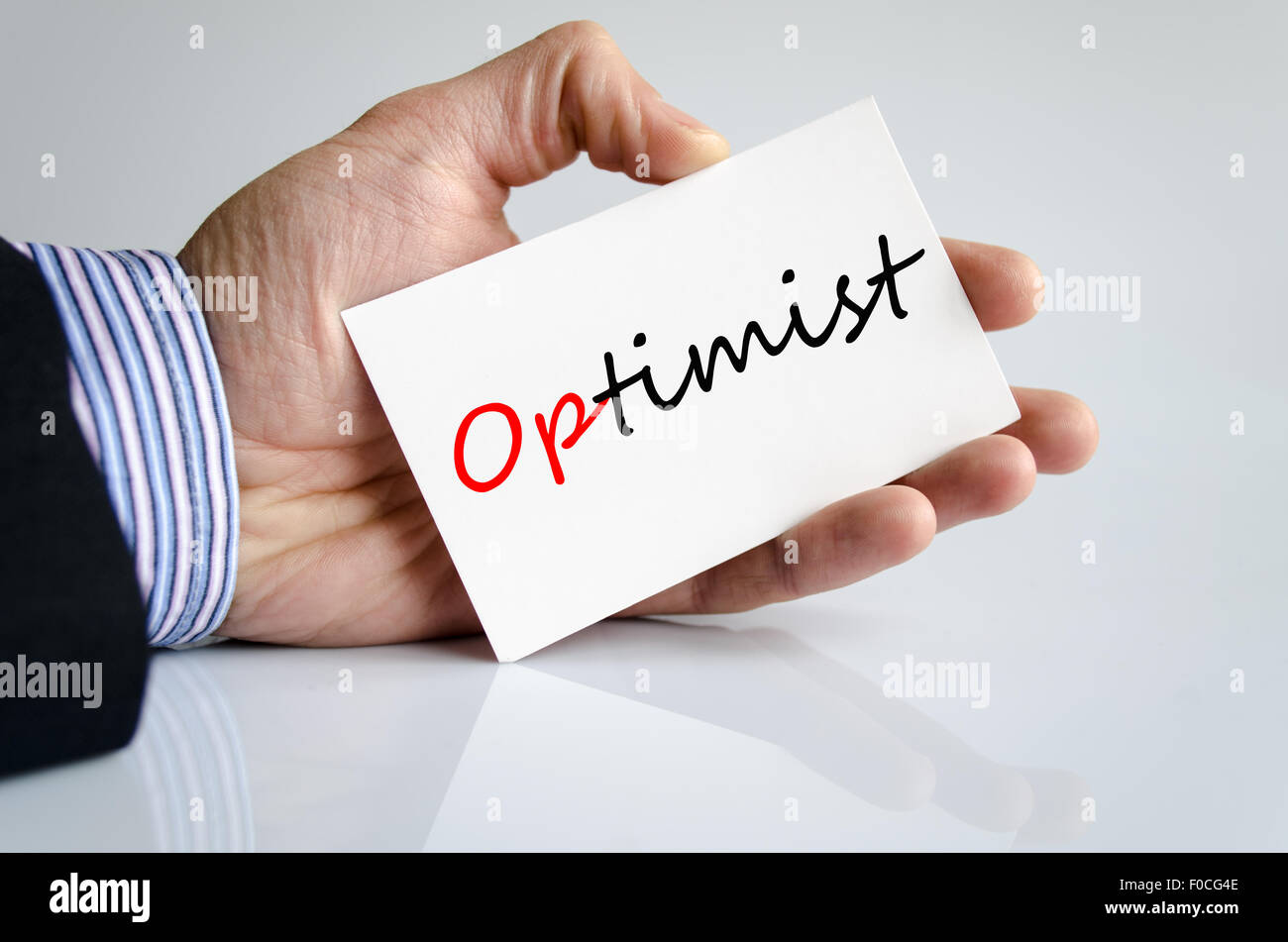 Optimist text concept isolated over white background Stock Photo - Alamy