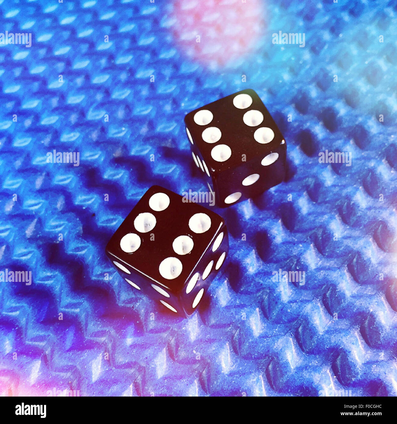 Dice on Blue Textured Background Stock Photo - Alamy