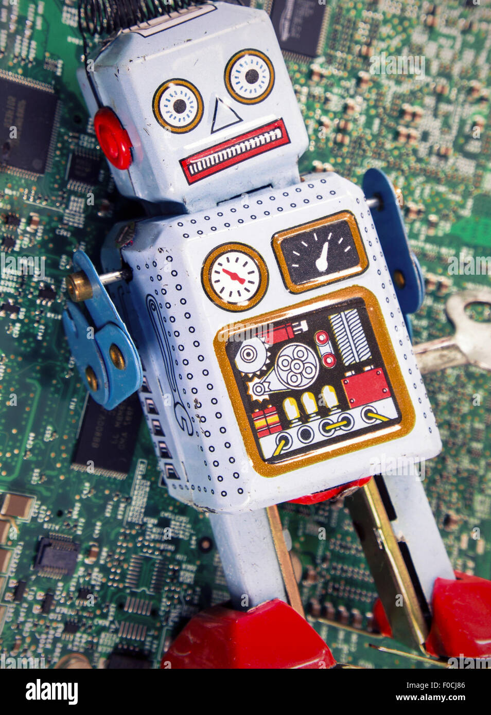 small robot toy on a circit board Stock Photo - Alamy