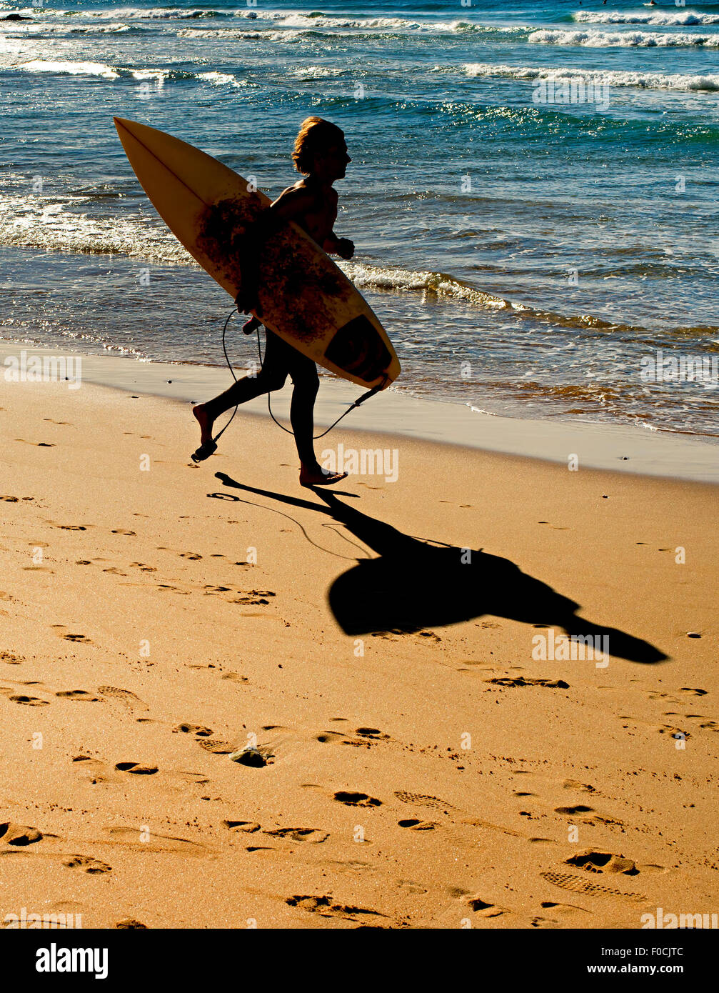 Surfer running with board hi-res stock photography and images - Alamy