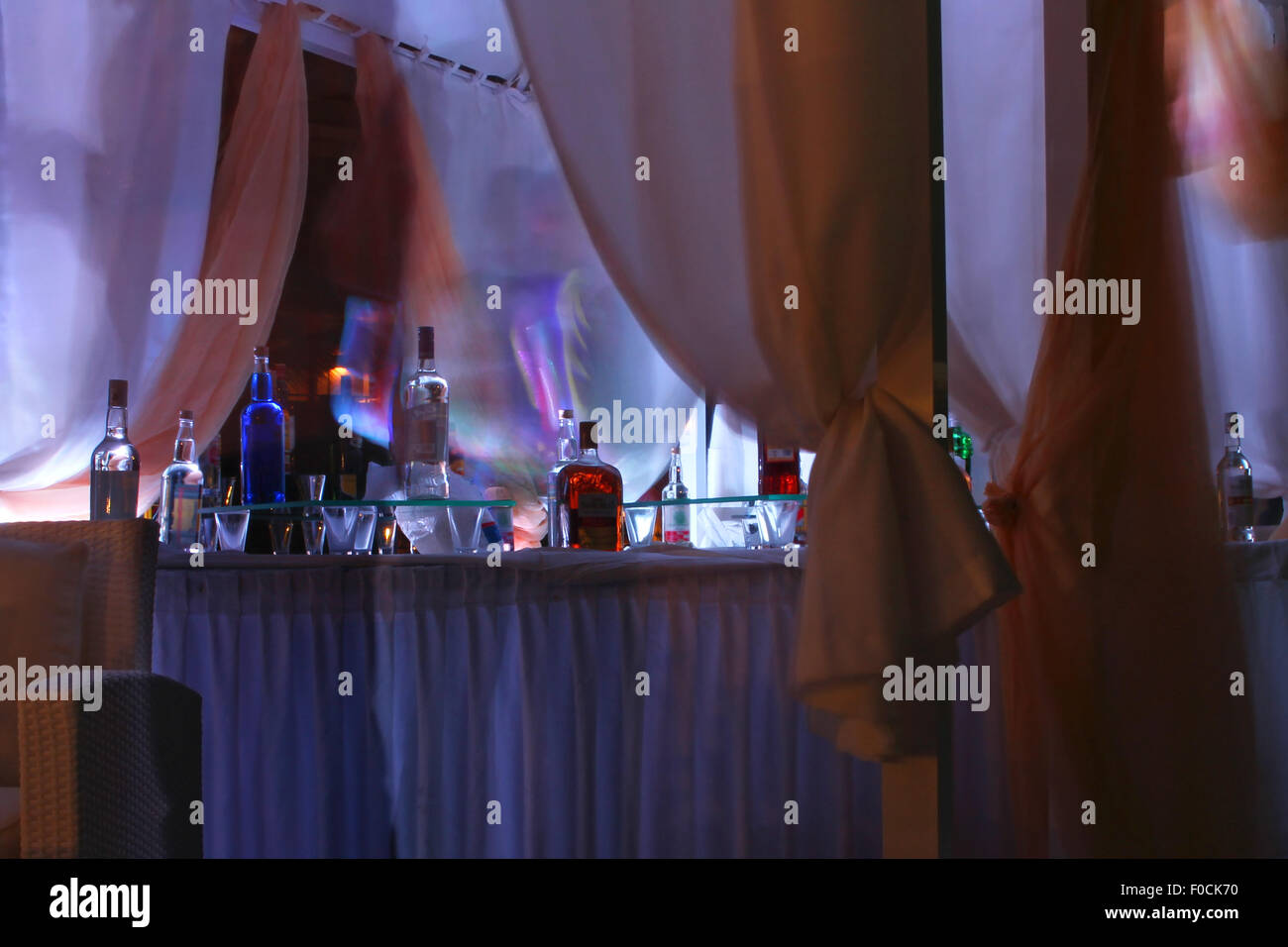 Outdoor bar at night Stock Photo - Alamy