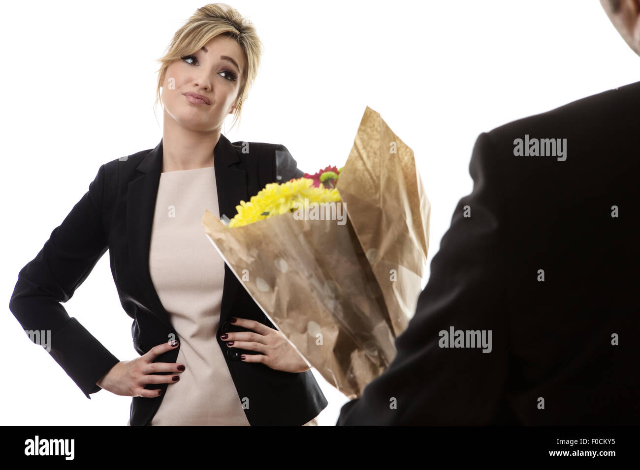 business woman getting flowers and not looking very impressed with her ...