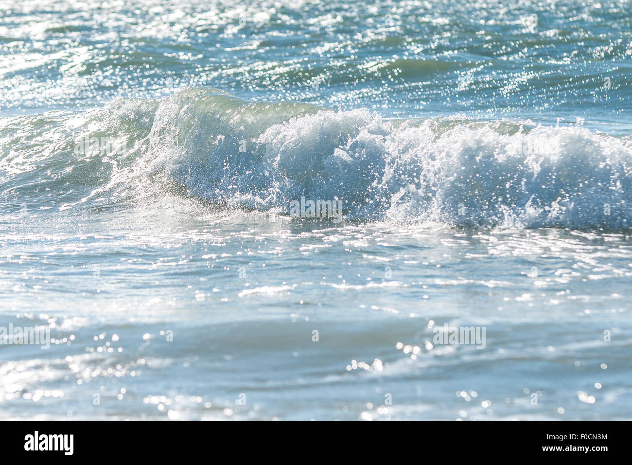 Ocean waves coming ashore Stock Photo - Alamy