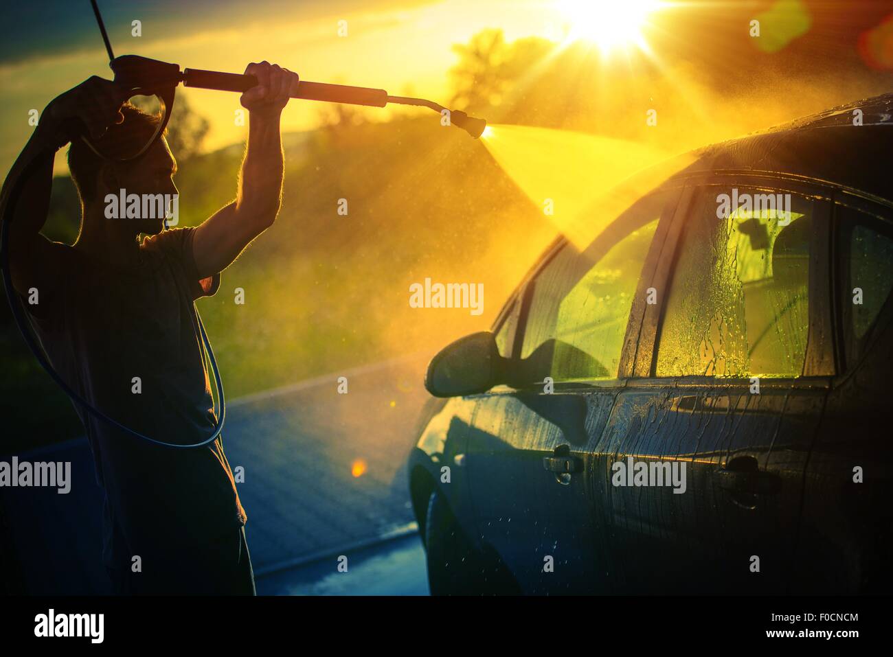 Vehicle Washing at Sunset, Hot Summer Afternoon Car Washing. High ...