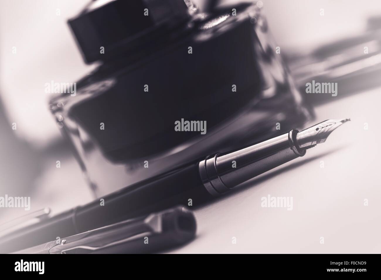 Fountain Pen and the Black Ink Bottle. Writing Concept Stock Photo - Alamy