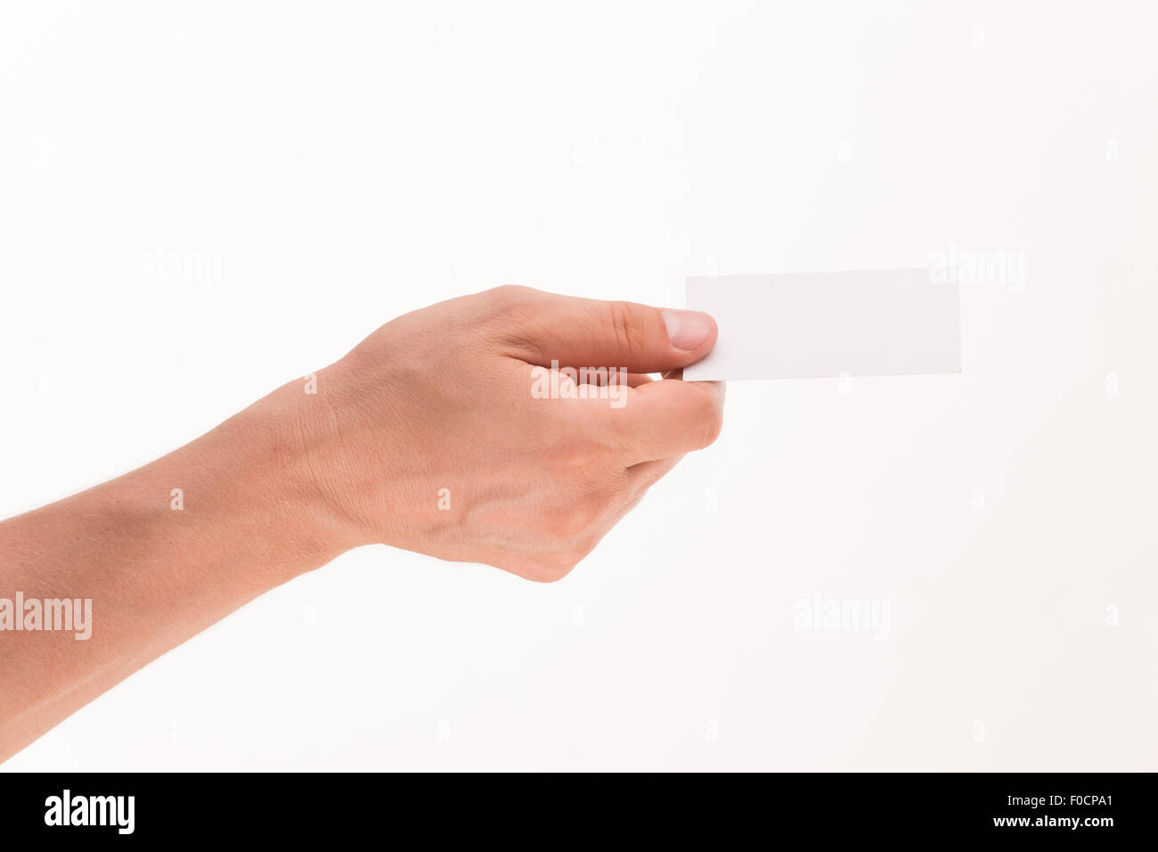 Man's hand holding blank card Stock Photo - Alamy
