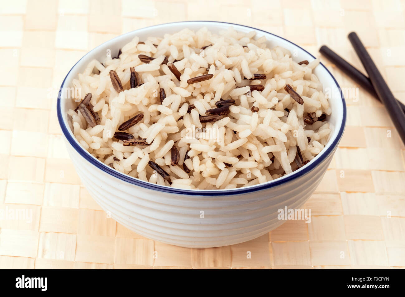 A bowl of long grain and wild rice - studio shot Stock Photo - Alamy