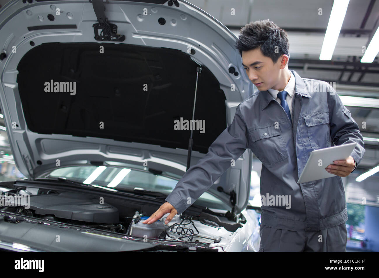 Machine part standing industry working manufacturing looking down ...