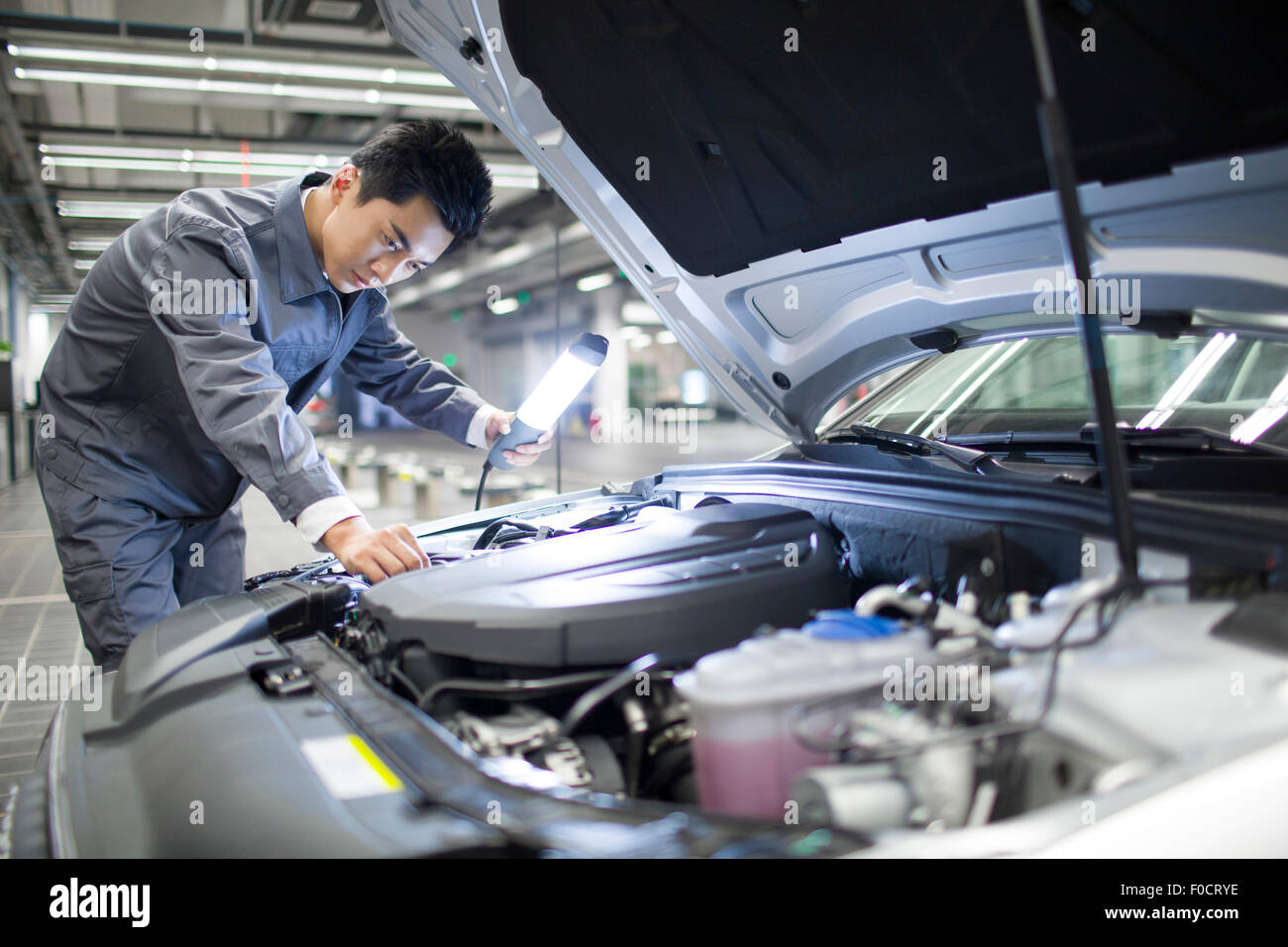 Machine part standing industry working manufacturing looking down ...