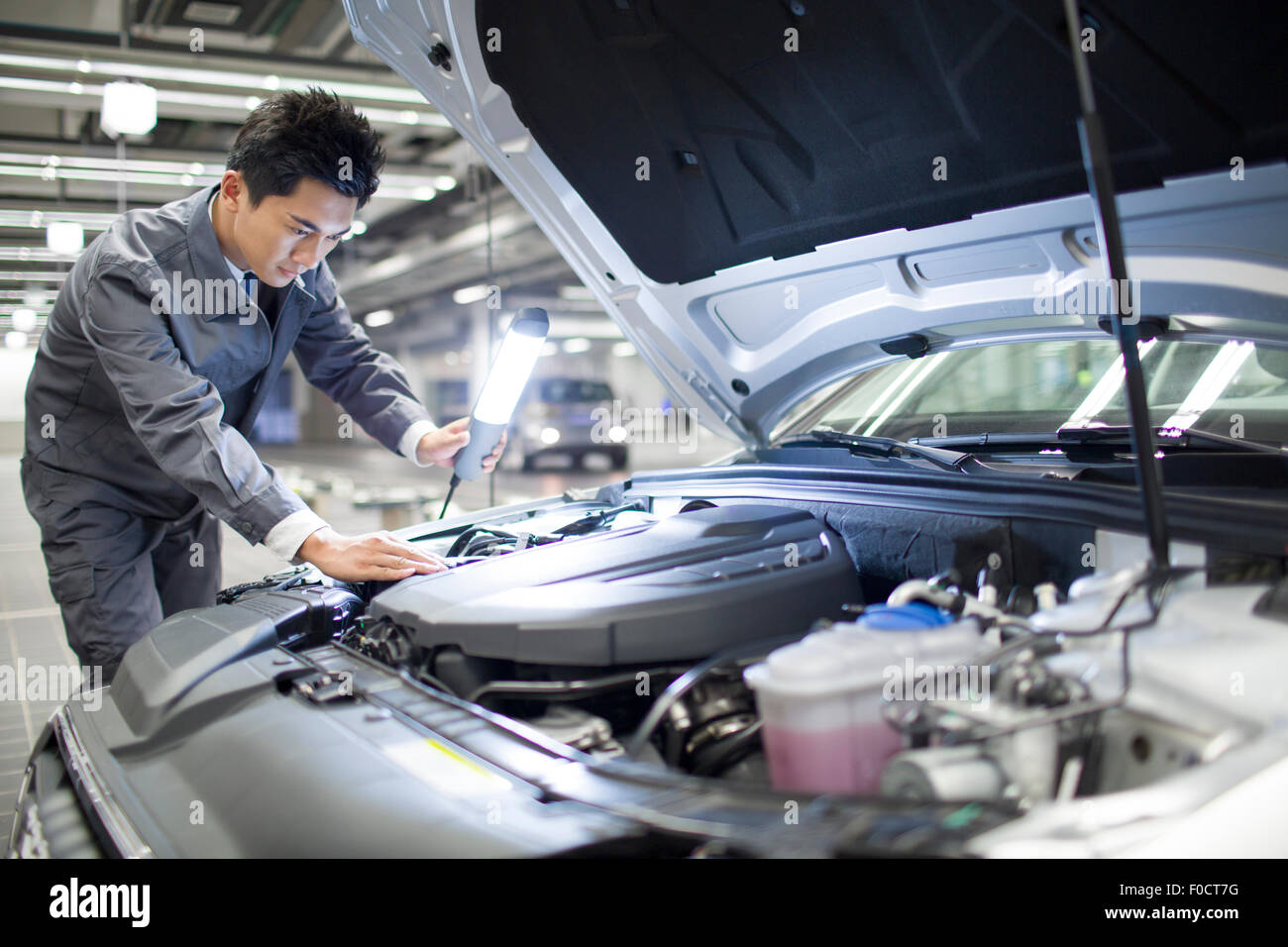 Machine part standing industry working manufacturing looking down ...