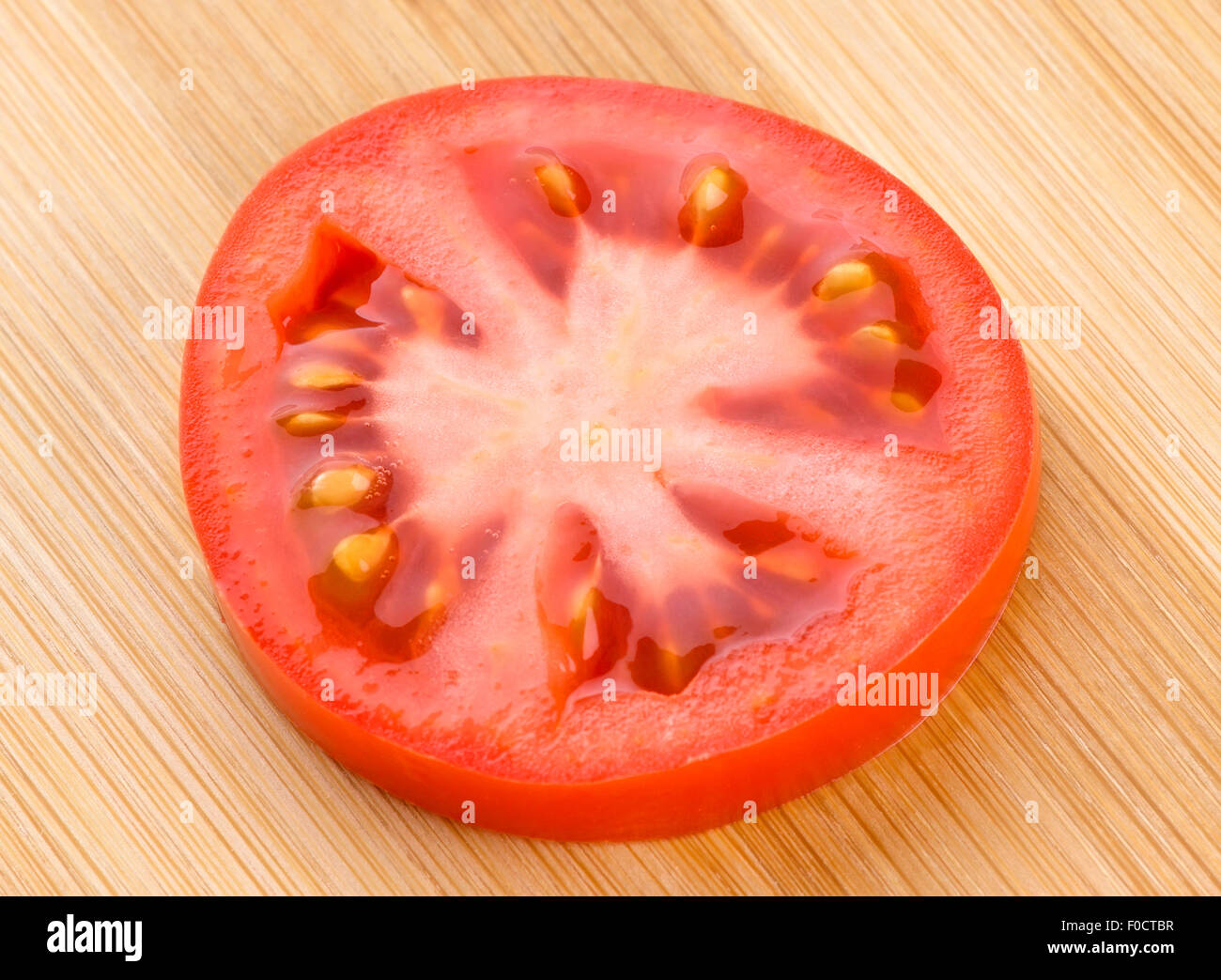 Fresh slice tomato background Stock Photo - Alamy