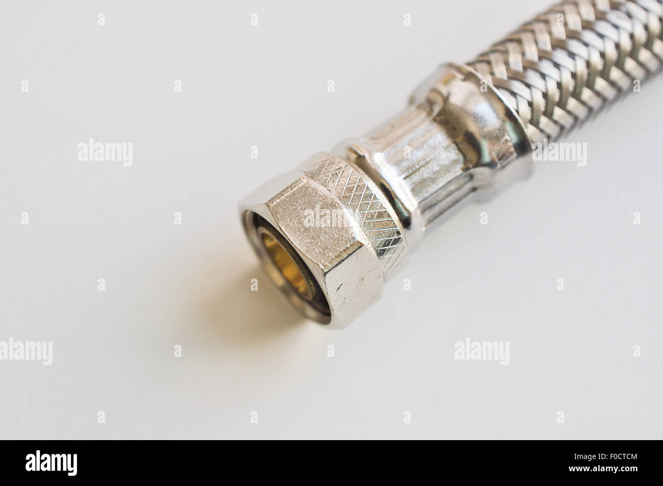 Faucet connector on white background Stock Photo - Alamy