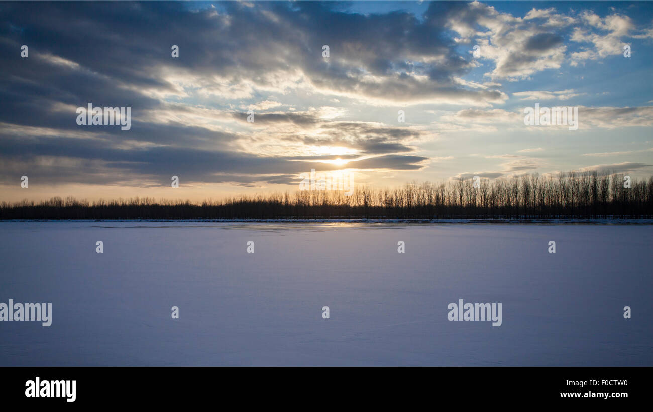 Sky and snow-covered landscape Stock Photo - Alamy