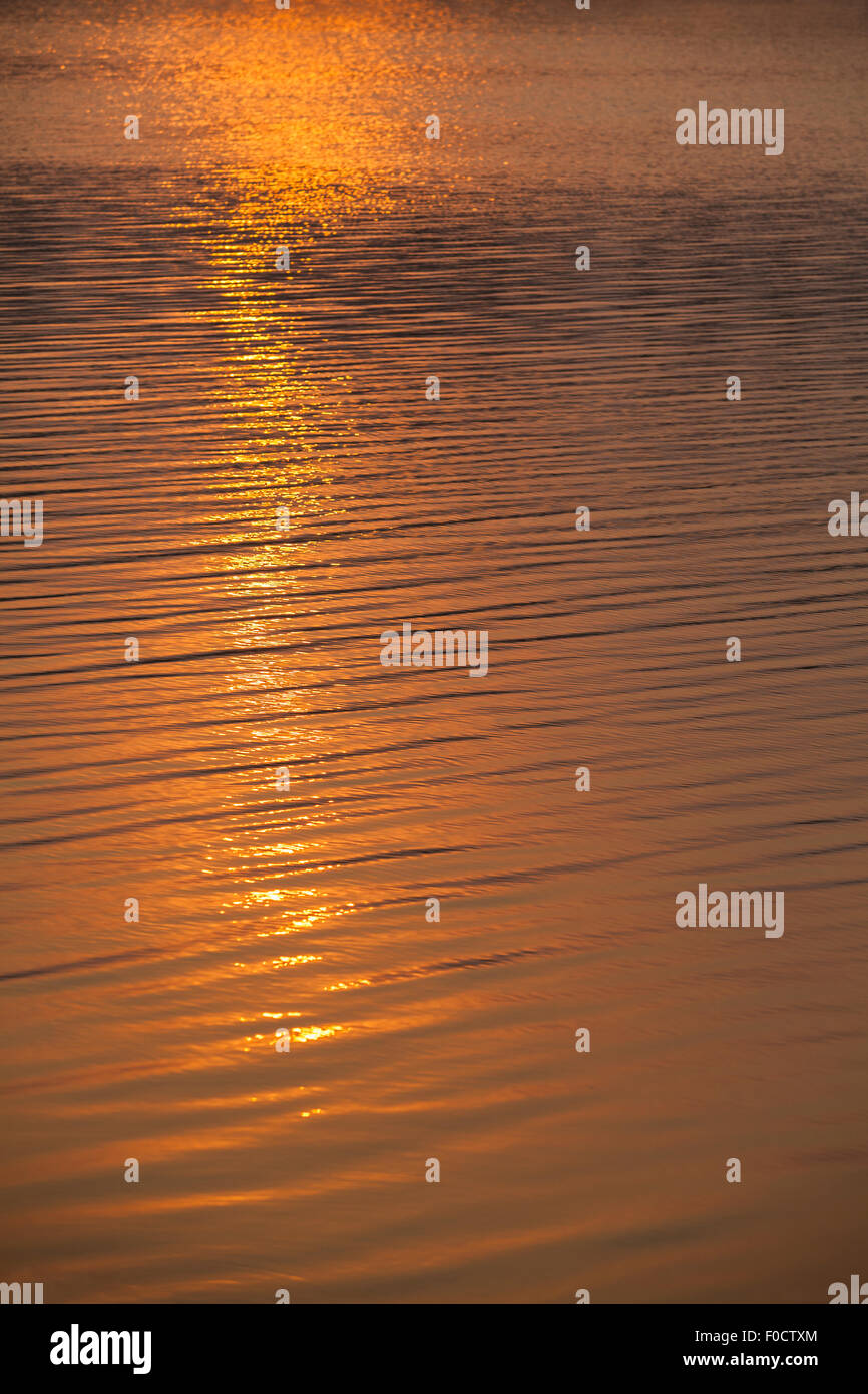 Reflection sun in water surface hi-res stock photography and images - Alamy
