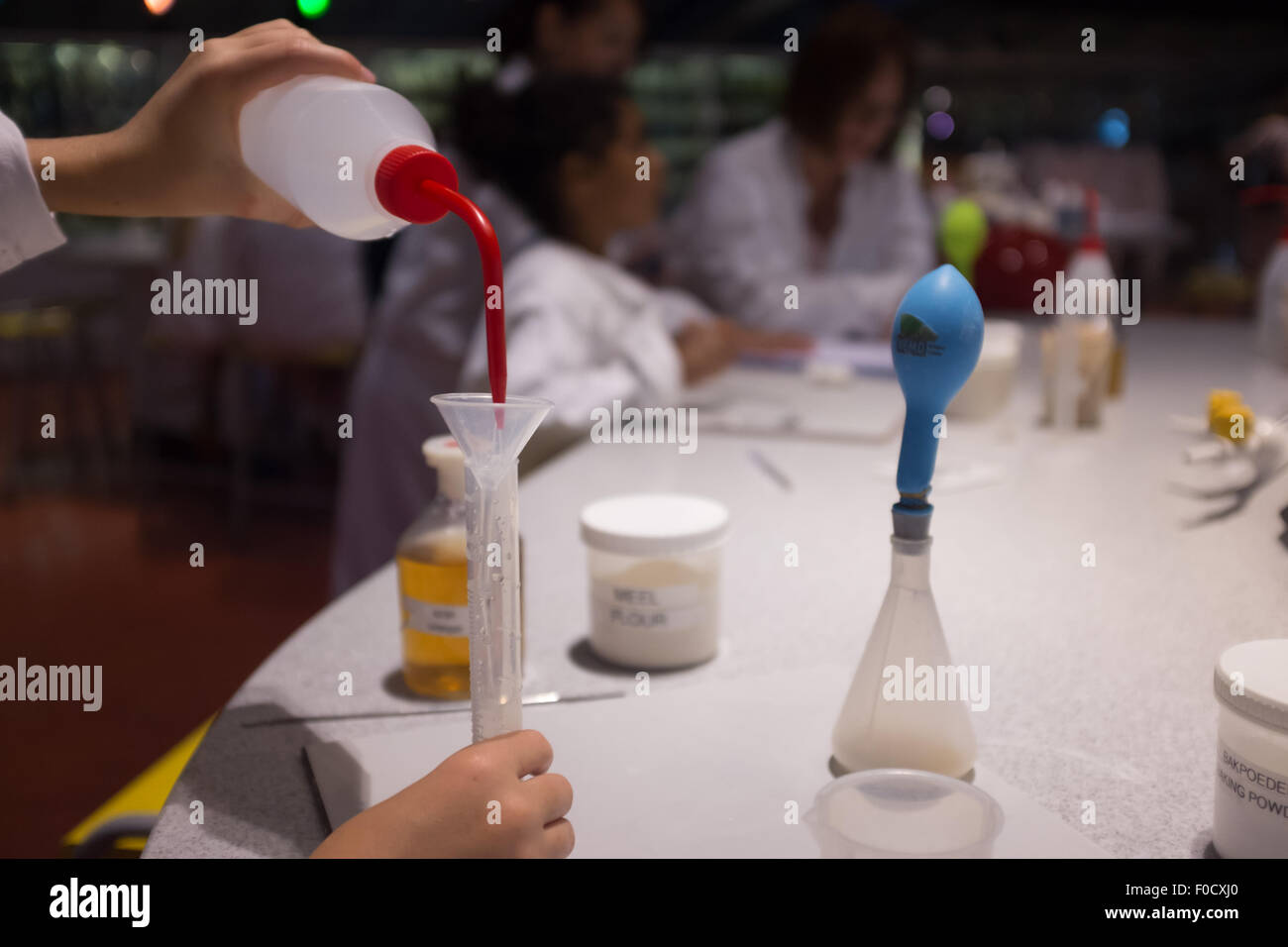 Children in a chemistry lesson doing practical experiments Stock Photo ...