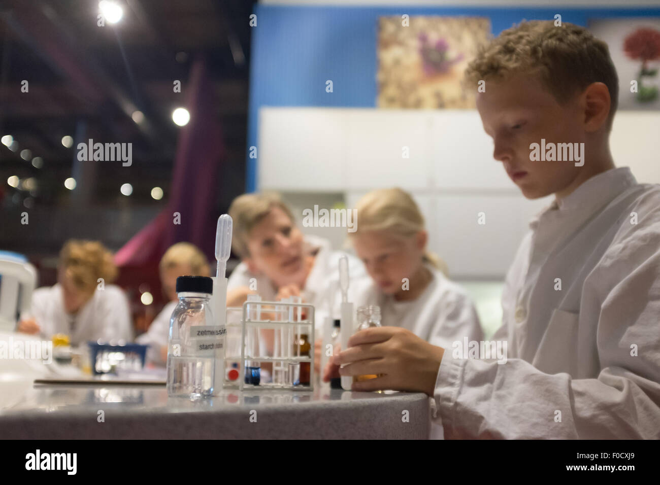 Children in a chemistry lesson doing practical experiments Stock Photo ...