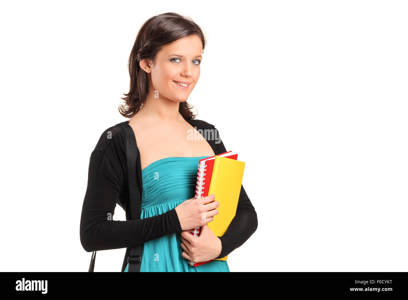 Female student holding notebooks isolated on white Stock Photo - Alamy