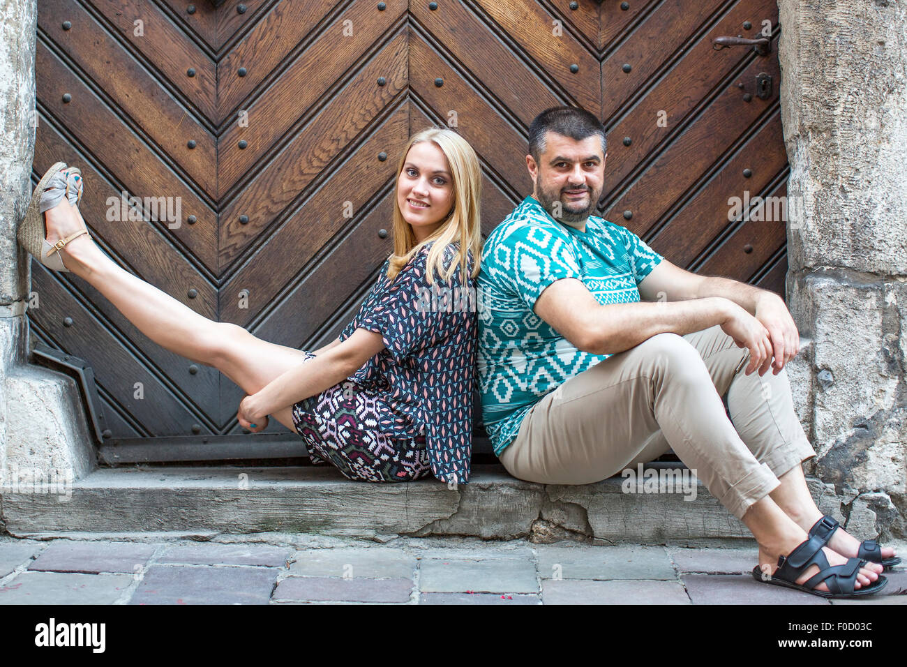 Old young sitting hi-res stock photography and images - Alamy