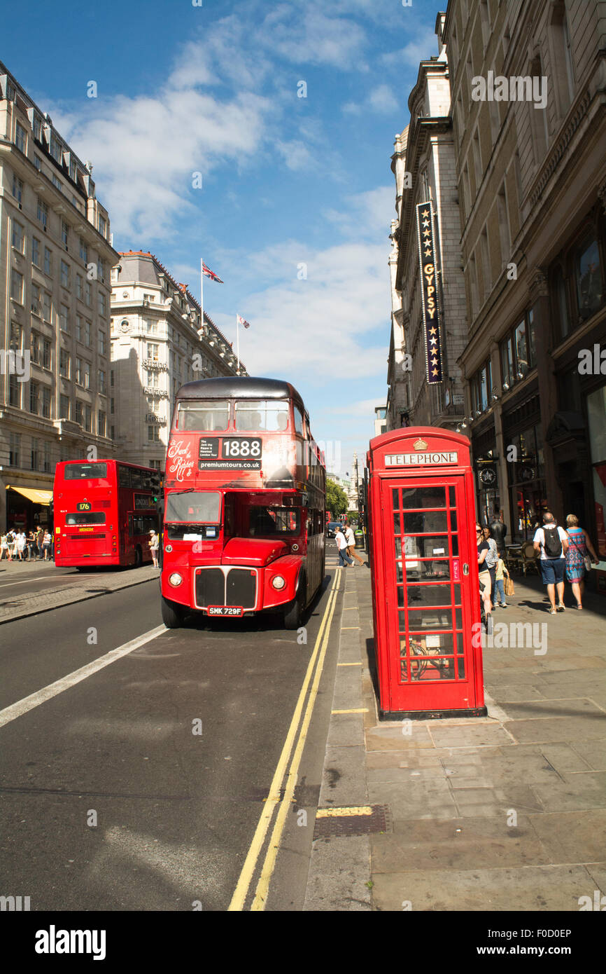 Red Premium Tours Routemaster bus on the Strand in London Stock Photo ...