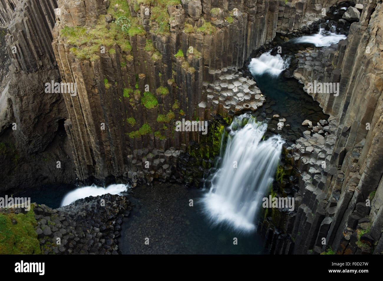 Litlanesfoss waterfall, Hengifossá river, basalt lava solidified in ...