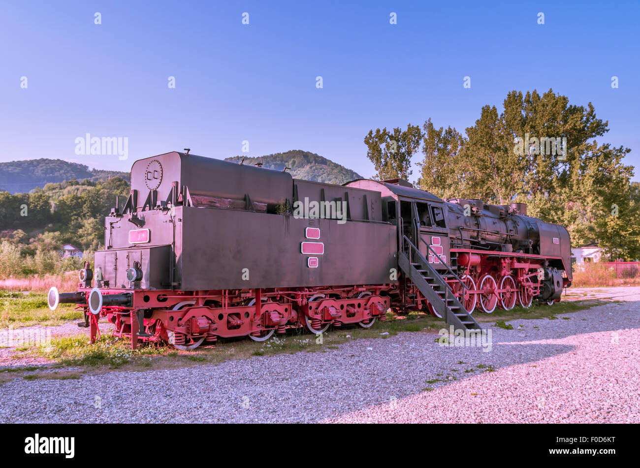 Old black steam powered railway train. Restored old vintage steam train ...