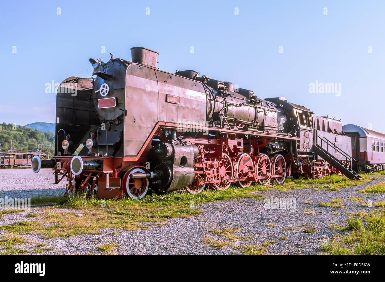Old black steam powered railway train. Restored old vintage steam train ...