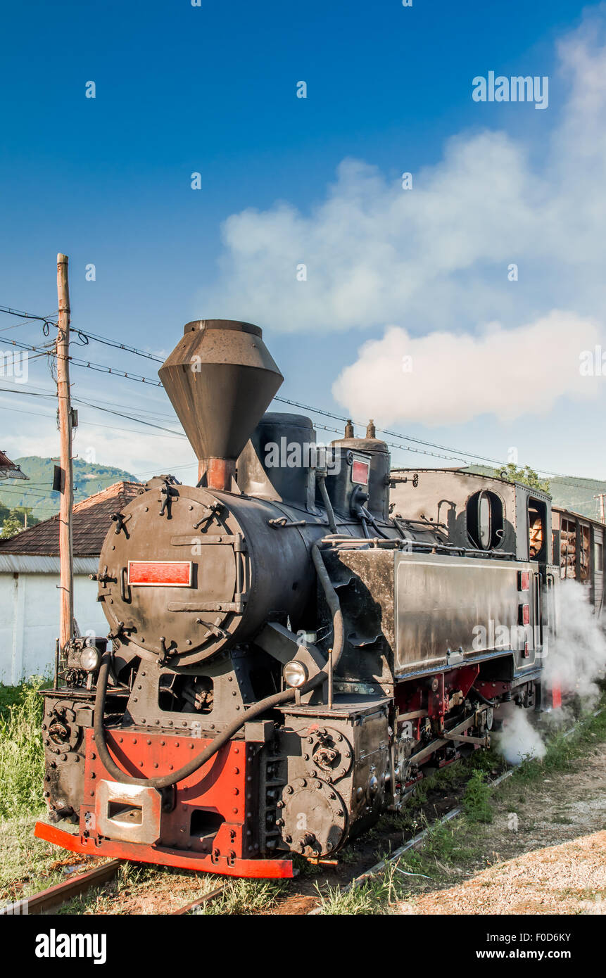 Old black steam powered railway train. Restored old vintage steam train ...