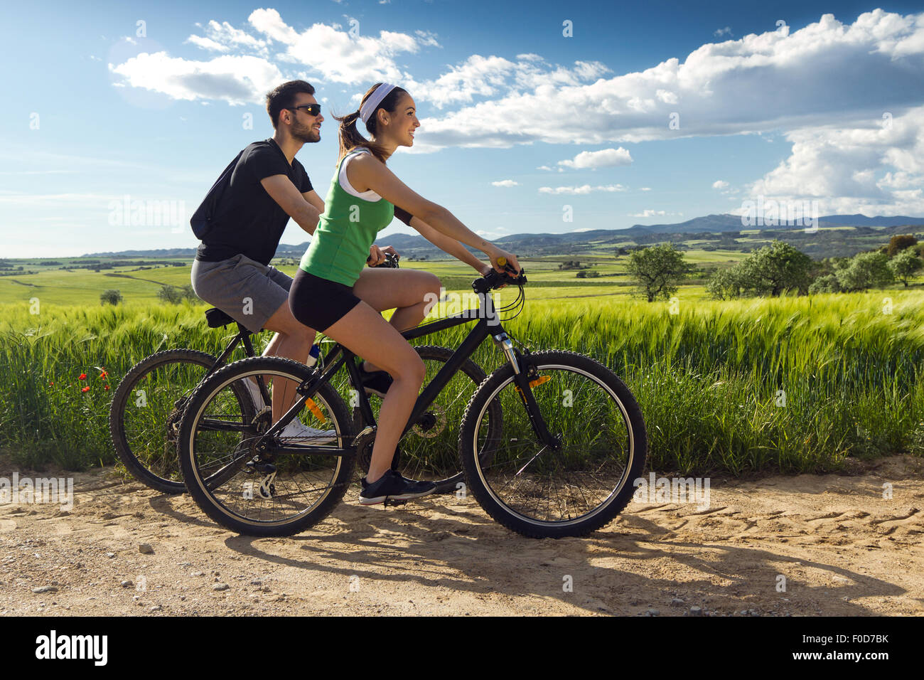 Man woman ride countryside hi-res stock photography and images - Alamy