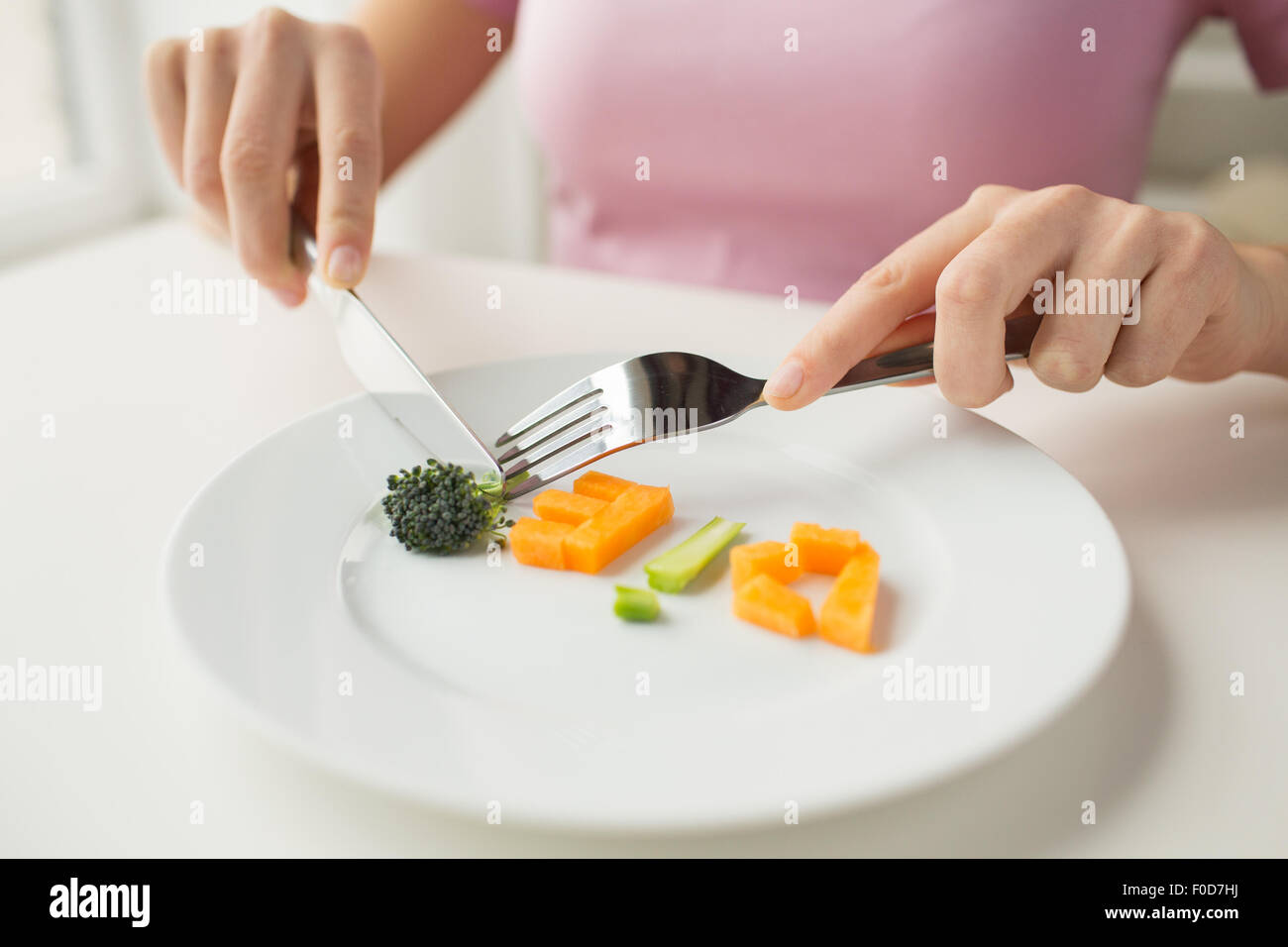 Woman eating with hands hi-res stock photography and images - Alamy