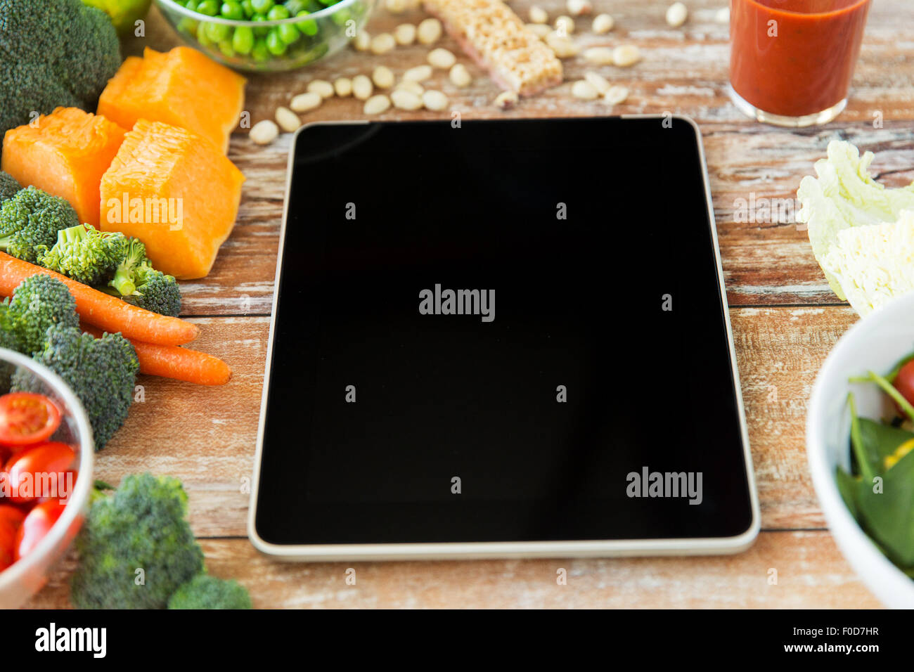 cooking, technology, advertising and home concept - close up of male ...