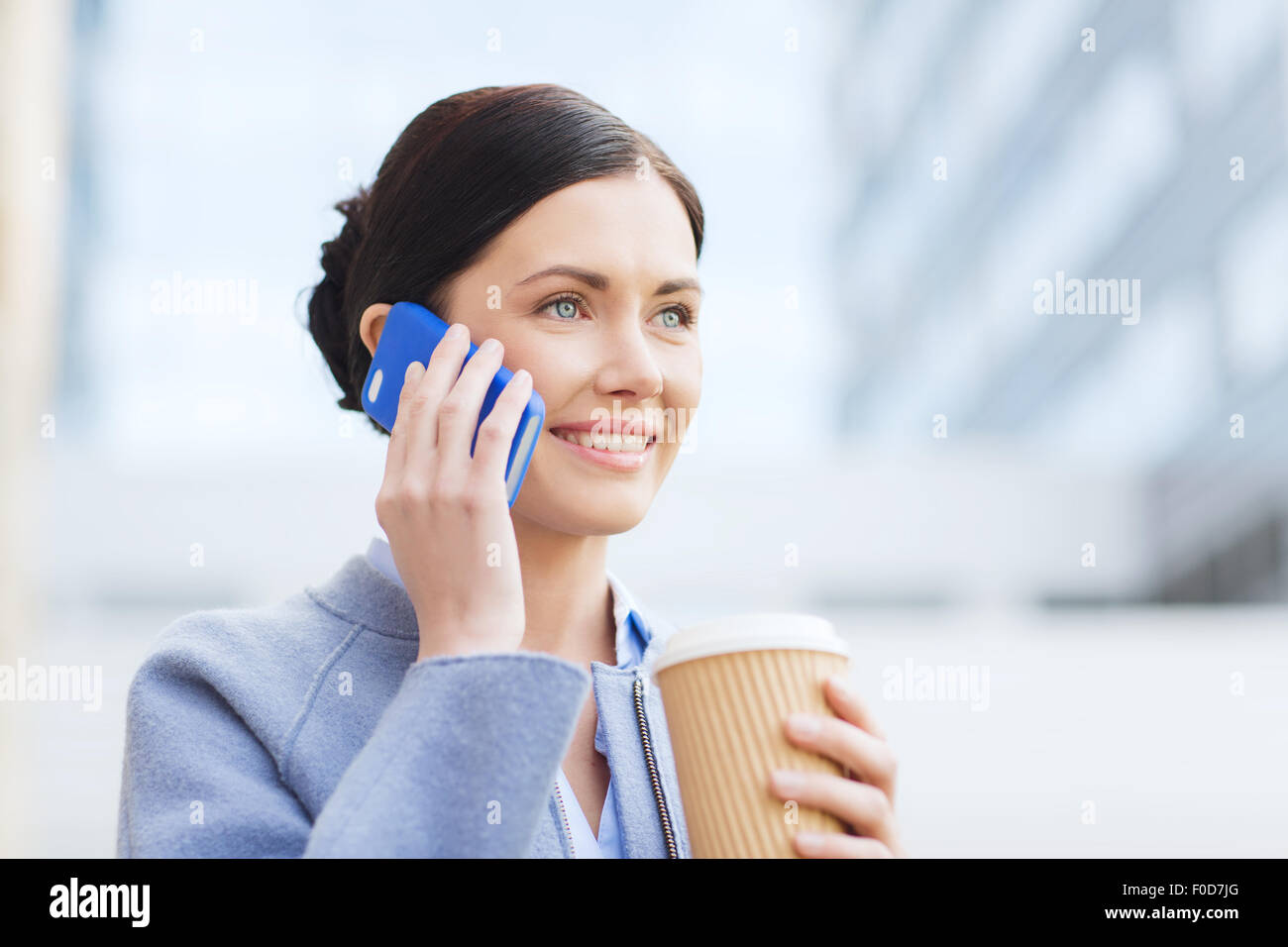 Pretty woman drinking coffee talking hi-res stock photography and ...