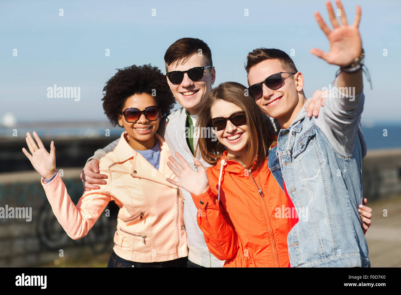 Waving hands to their friends hi-res stock photography and images - Alamy