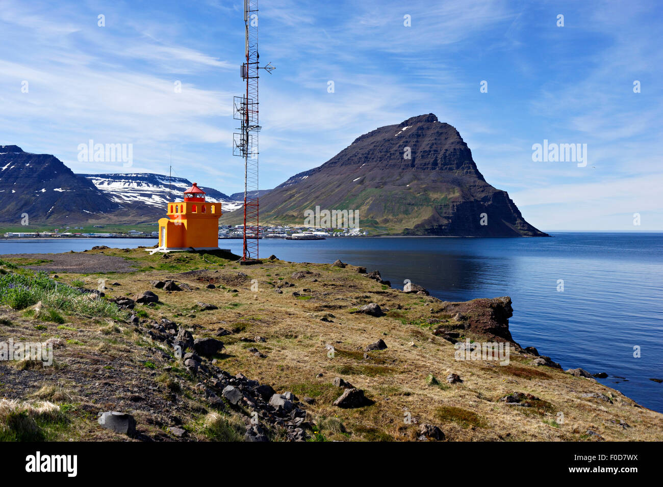 Lighthouse of Ósvoer, town of Bolungarvik, Ísafjarðardjúp fjord ...