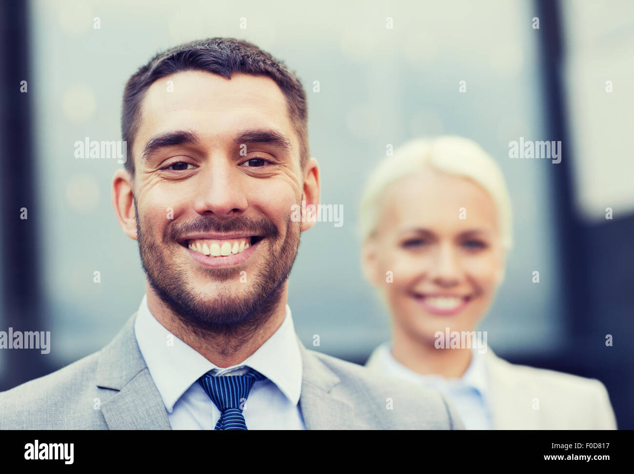 close up of smiling businessmen Stock Photo - Alamy
