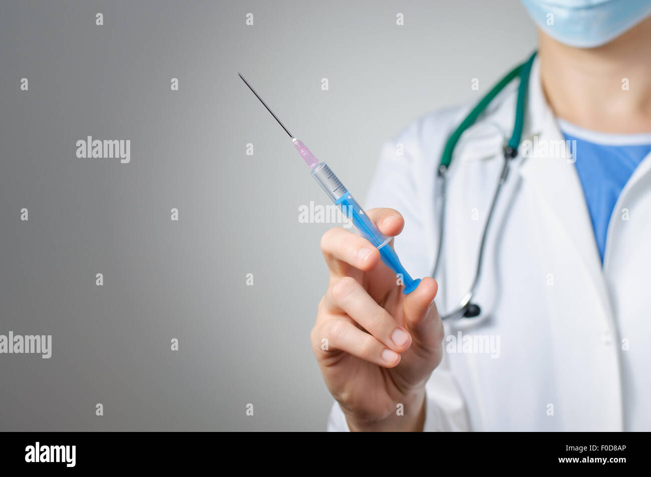 Doctor using insulin syringe hi-res stock photography and images - Alamy