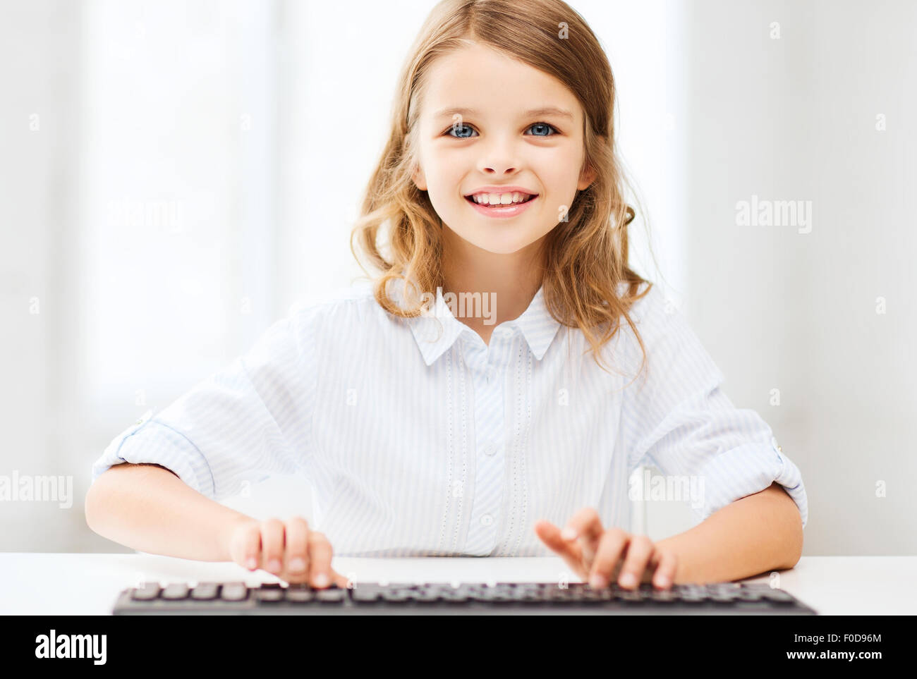 student girl with keyboard Stock Photo - Alamy