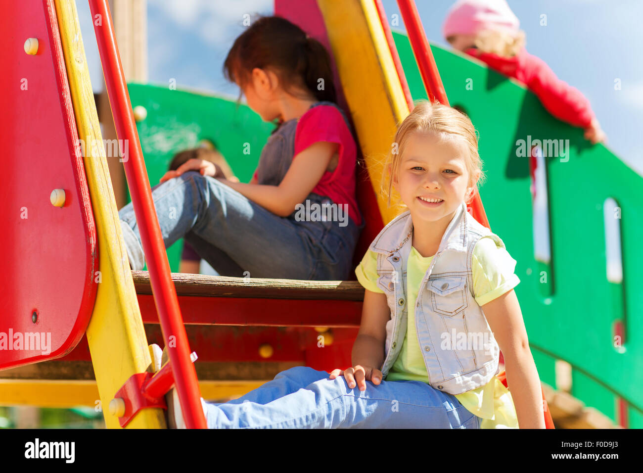 happy kids on children playground Stock Photo - Alamy