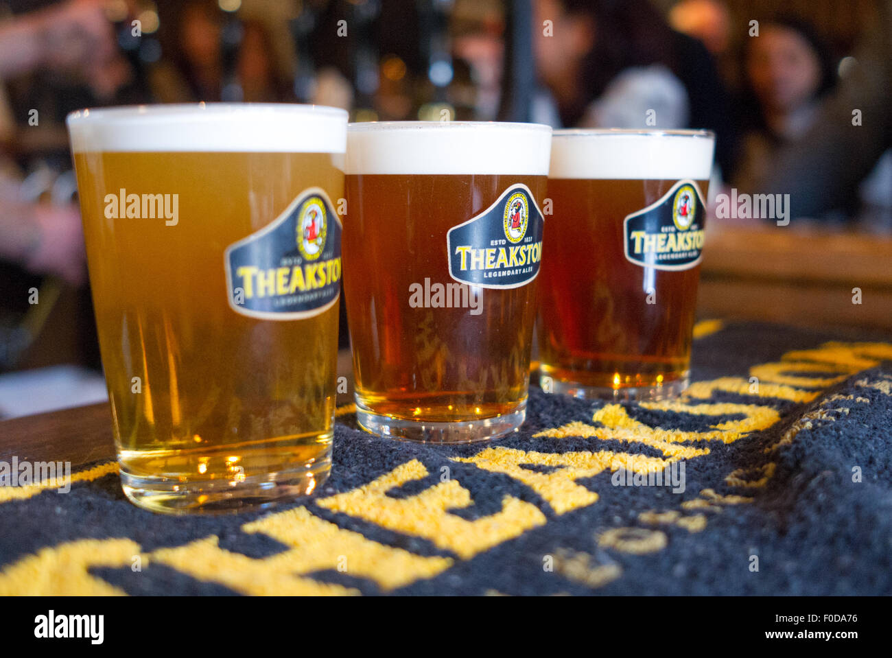 Sample beer at Theakstons Brewery Masham Yorkshire England Stock Photo ...